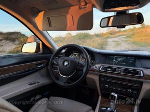 Black BMW 7 Series 2011 in Tallinn, with an engine capacity of 3.00 L and mileage of 293 thousand km for 11850 €, photo 10 on AUTOMOTO.COM.LV