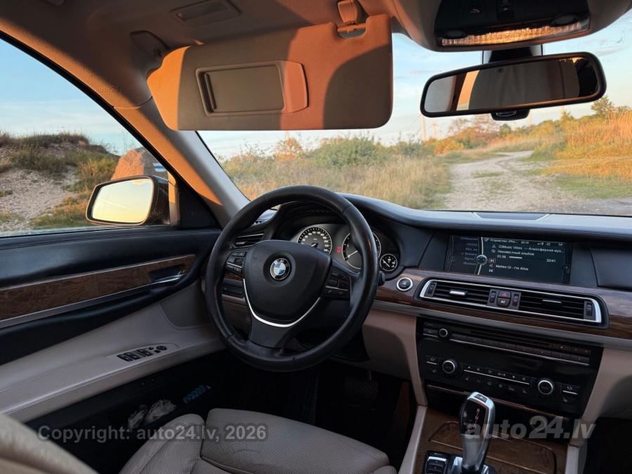 Black BMW 7 Series 2011 in Tallinn, with an engine capacity of 3.00 L and mileage of 293 thousand km for 11850 €, photo 10 on AUTOMOTO.COM.LV