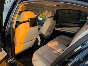 Black BMW 7 Series 2011 in Tallinn, with an engine capacity of 3.00 L and mileage of 293 thousand km for 11850 €, photo 11 on AUTOMOTO.COM.LV