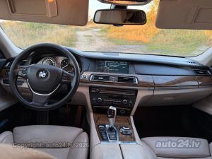 Black BMW 7 Series 2011 in Tallinn, with an engine capacity of 3.00 L and mileage of 293 thousand km for 11850 €, photo 12 on AUTOMOTO.COM.LV
