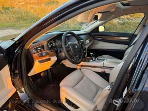 Black BMW 7 Series 2011 in Tallinn, with an engine capacity of 3.00 L and mileage of 293 thousand km for 11850 €, photo 13 on AUTOMOTO.COM.LV