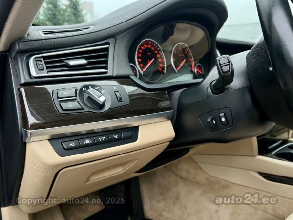 Black BMW 7 Series 2012 in Parnu, with an engine capacity of 3.00 L and mileage of 274 thousand km for 11990 €, photo 11 on AUTOMOTO.COM.LV