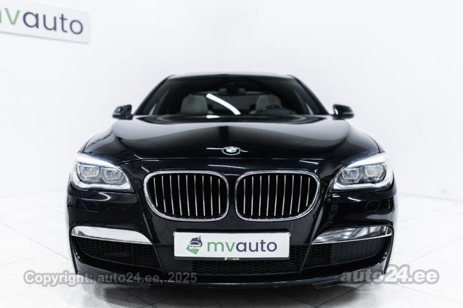 Black BMW 7 Series 2012 in Tallinn, with an engine capacity of 3.00 L and mileage of 217 thousand km for 15990 €, photo 4 on AUTOMOTO.COM.LV