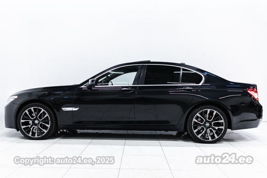 Black BMW 7 Series 2012 in Tallinn, with an engine capacity of 3.00 L and mileage of 217 thousand km for 15990 €, photo 10 on AUTOMOTO.COM.LV