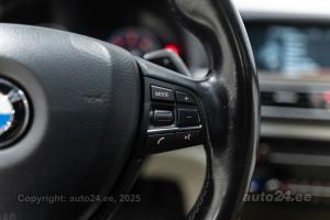 Black BMW 7 Series 2012 in Tallinn, with an engine capacity of 3.00 L and mileage of 217 thousand km for 15990 €, photo 25 on AUTOMOTO.COM.LV