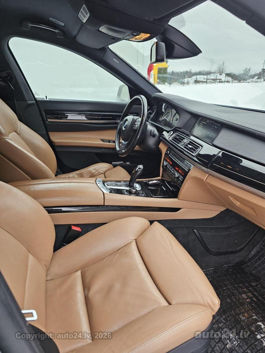 Melns BMW 7 Series 2012 Rapla, ar dzinēja tilpumu 3.00 L un nobraukumu 390 tūkst. km par 13000 €, foto 14 vietnē AUTOMOTO.COM.LV