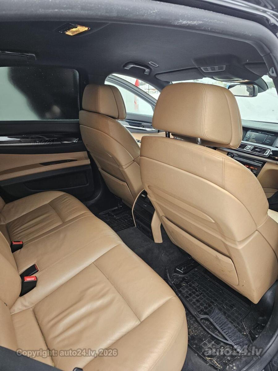 Melns BMW 7 Series 2012 Rapla, ar dzinēja tilpumu 3.00 L un nobraukumu 390 tūkst. km par 13000 €, foto 19 vietnē AUTOMOTO.COM.LV