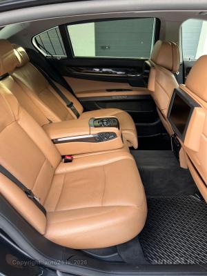 Black BMW 7 Series 2012 in Tartu, with an engine capacity of 3.00 L and mileage of 236 thousand km for 11999 €, photo 14 on AUTOMOTO.COM.LV