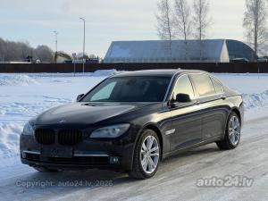 Black BMW 7 Series 2012 in Tartu, with an engine capacity of 3.00 L and mileage of 236 thousand km for 11999 €, photo 22 on AUTOMOTO.COM.LV