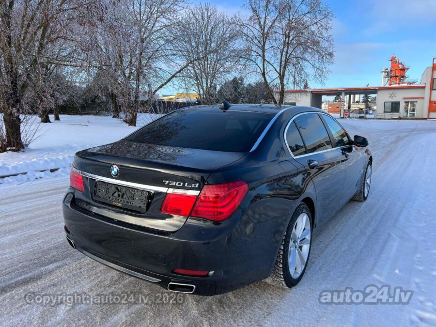 Black BMW 7 Series 2012 in Tartu, with an engine capacity of 3.00 L and mileage of 236 thousand km for 11999 €, photo 24 on AUTOMOTO.COM.LV