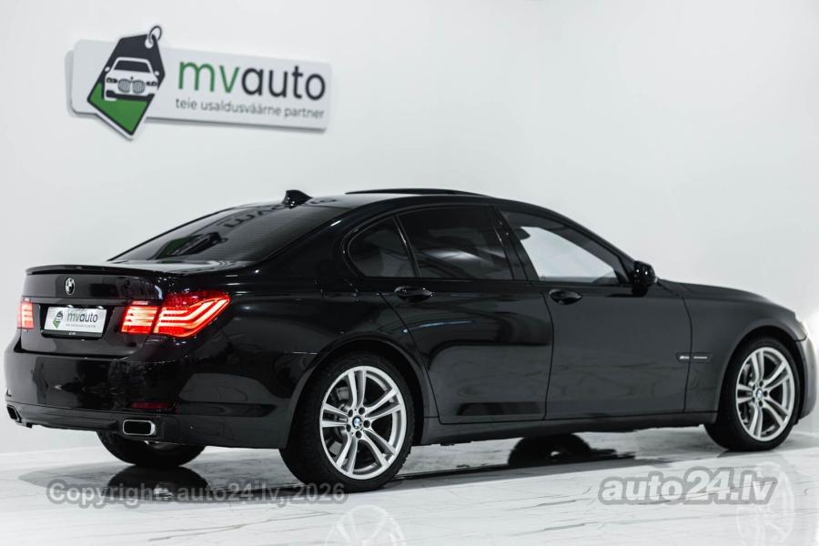 Black BMW 7 Series 2012 in Tallinn, with an engine capacity of 3.00 L and mileage of 239 thousand km for 11990 €, photo 3 on AUTOMOTO.COM.LV