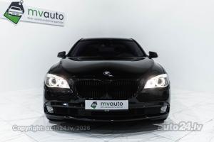 Black BMW 7 Series 2012 in Tallinn, with an engine capacity of 3.00 L and mileage of 239 thousand km for 11990 €, photo 5 on AUTOMOTO.COM.LV