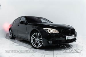 Black BMW 7 Series 2012 in Tallinn, with an engine capacity of 3.00 L and mileage of 239 thousand km for 11990 €, photo 6 on AUTOMOTO.COM.LV