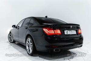 Black BMW 7 Series 2012 in Tallinn, with an engine capacity of 3.00 L and mileage of 239 thousand km for 11990 €, photo 7 on AUTOMOTO.COM.LV