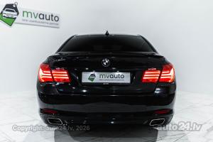Black BMW 7 Series 2012 in Tallinn, with an engine capacity of 3.00 L and mileage of 239 thousand km for 11990 €, photo 8 on AUTOMOTO.COM.LV