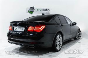 Black BMW 7 Series 2012 in Tallinn, with an engine capacity of 3.00 L and mileage of 239 thousand km for 11990 €, photo 9 on AUTOMOTO.COM.LV
