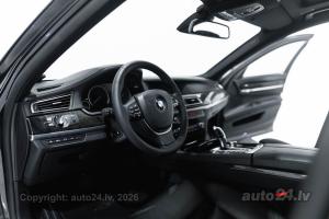 Black BMW 7 Series 2012 in Tallinn, with an engine capacity of 3.00 L and mileage of 239 thousand km for 11990 €, photo 13 on AUTOMOTO.COM.LV
