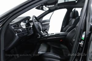 Black BMW 7 Series 2012 in Tallinn, with an engine capacity of 3.00 L and mileage of 239 thousand km for 11990 €, photo 14 on AUTOMOTO.COM.LV