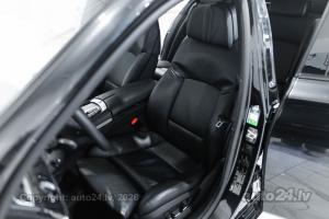 Black BMW 7 Series 2012 in Tallinn, with an engine capacity of 3.00 L and mileage of 239 thousand km for 11990 €, photo 15 on AUTOMOTO.COM.LV