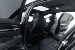 Black BMW 7 Series 2012 in Tallinn, with an engine capacity of 3.00 L and mileage of 239 thousand km for 11990 €, photo 20 on AUTOMOTO.COM.LV