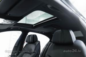 Black BMW 7 Series 2012 in Tallinn, with an engine capacity of 3.00 L and mileage of 239 thousand km for 11990 €, photo 21 on AUTOMOTO.COM.LV