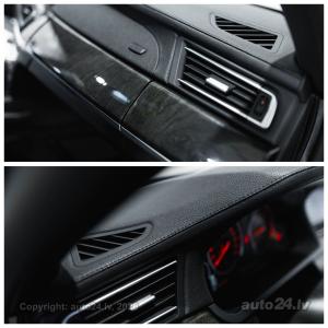 Black BMW 7 Series 2012 in Tallinn, with an engine capacity of 3.00 L and mileage of 239 thousand km for 11990 €, photo 23 on AUTOMOTO.COM.LV