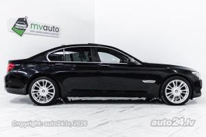 Black BMW 7 Series 2012 in Tallinn, with an engine capacity of 3.00 L and mileage of 240 thousand km for 12990 €, photo 11 on AUTOMOTO.COM.LV