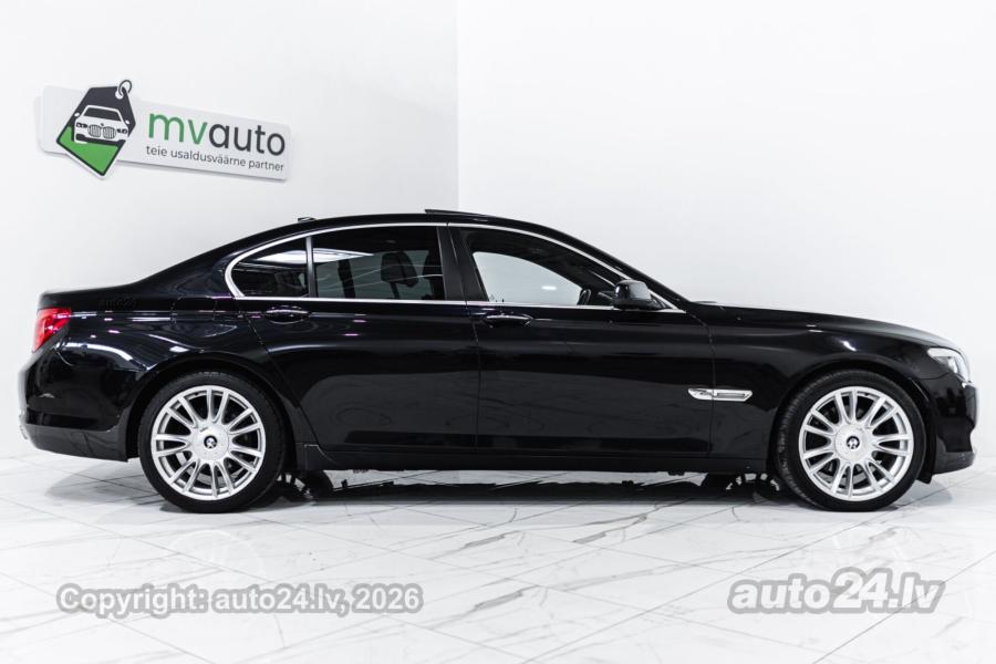 Black BMW 7 Series 2012 in Tallinn, with an engine capacity of 3.00 L and mileage of 240 thousand km for 12990 €, photo 11 on AUTOMOTO.COM.LV