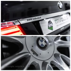 Black BMW 7 Series 2012 in Tallinn, with an engine capacity of 3.00 L and mileage of 240 thousand km for 12990 €, photo 12 on AUTOMOTO.COM.LV
