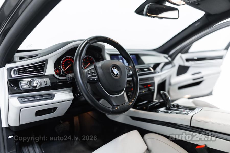 Black BMW 7 Series 2012 in Tallinn, with an engine capacity of 3.00 L and mileage of 240 thousand km for 12990 €, photo 13 on AUTOMOTO.COM.LV