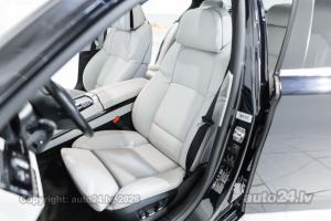 Black BMW 7 Series 2012 in Tallinn, with an engine capacity of 3.00 L and mileage of 240 thousand km for 12990 €, photo 14 on AUTOMOTO.COM.LV