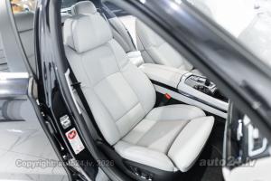 Black BMW 7 Series 2012 in Tallinn, with an engine capacity of 3.00 L and mileage of 240 thousand km for 12990 €, photo 16 on AUTOMOTO.COM.LV