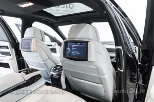 Black BMW 7 Series 2012 in Tallinn, with an engine capacity of 3.00 L and mileage of 240 thousand km for 12990 €, photo 17 on AUTOMOTO.COM.LV