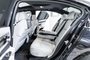 Black BMW 7 Series 2012 in Tallinn, with an engine capacity of 3.00 L and mileage of 240 thousand km for 12990 €, photo 18 on AUTOMOTO.COM.LV