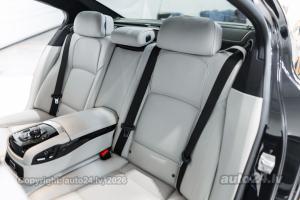 Black BMW 7 Series 2012 in Tallinn, with an engine capacity of 3.00 L and mileage of 240 thousand km for 12990 €, photo 19 on AUTOMOTO.COM.LV