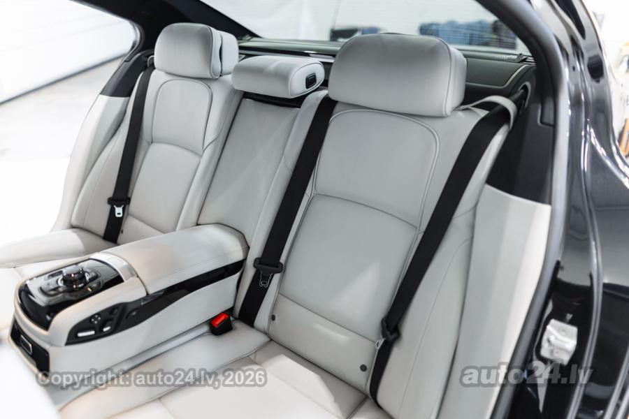 Black BMW 7 Series 2012 in Tallinn, with an engine capacity of 3.00 L and mileage of 240 thousand km for 12990 €, photo 19 on AUTOMOTO.COM.LV