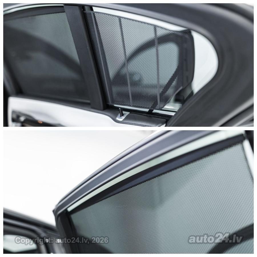 Black BMW 7 Series 2012 in Tallinn, with an engine capacity of 3.00 L and mileage of 240 thousand km for 12990 €, photo 27 on AUTOMOTO.COM.LV