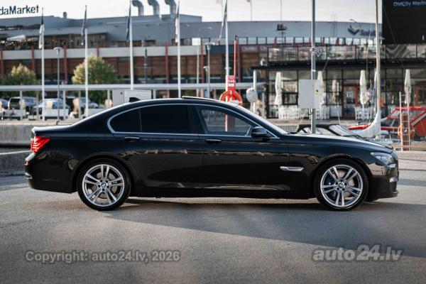 Black BMW 7 Series 2012 in Tallinn, with an engine capacity of 3.00 L and mileage of 263 thousand km for 16999 €, photo 7 on AUTOMOTO.COM.LV