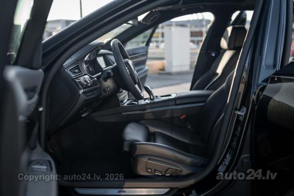 Black BMW 7 Series 2012 in Tallinn, with an engine capacity of 3.00 L and mileage of 263 thousand km for 16999 €, photo 10 on AUTOMOTO.COM.LV