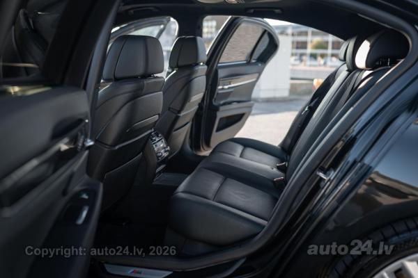 Black BMW 7 Series 2012 in Tallinn, with an engine capacity of 3.00 L and mileage of 263 thousand km for 16999 €, photo 11 on AUTOMOTO.COM.LV