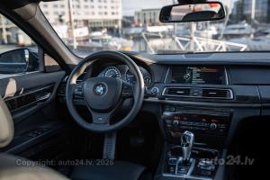 Black BMW 7 Series 2012 in Tallinn, with an engine capacity of 3.00 L and mileage of 263 thousand km for 16999 €, photo 14 on AUTOMOTO.COM.LV