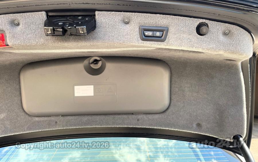 Black BMW 7 Series 2013 in Narva, with an engine capacity of 4.40 L and mileage of 185 thousand km for 16500 €, photo 6 on AUTOMOTO.COM.LV