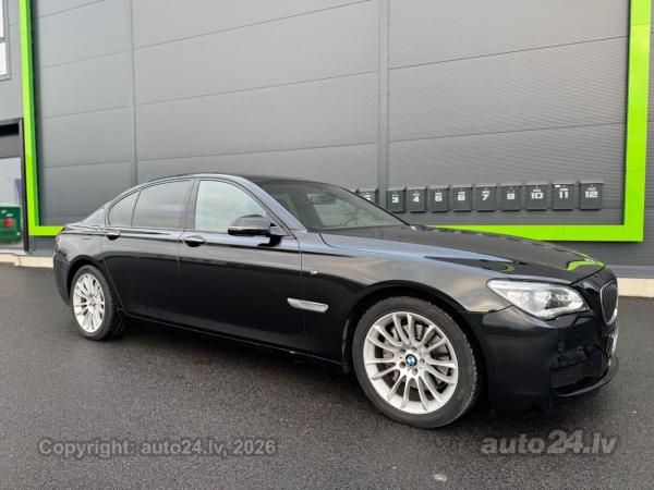 Melns BMW 7 Series 2014 Tallina, ar dzinēja tilpumu 3.00 L un nobraukumu 111 tūkst. km par 21499 €, foto 1 vietnē AUTOMOTO.COM.LV