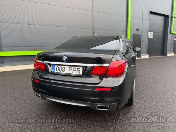 Melns BMW 7 Series 2014 Tallina, ar dzinēja tilpumu 3.00 L un nobraukumu 111 tūkst. km par 21499 €, foto 7 vietnē AUTOMOTO.COM.LV