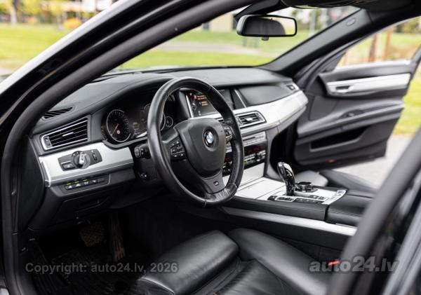 Black BMW 7 Series 2014 in Tallinn, with an engine capacity of 3.00 L and mileage of 178 thousand km for 18199 €, photo 7 on AUTOMOTO.COM.LV