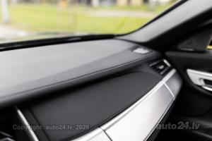 Melns BMW 7 Series 2014 Tallina, ar dzinēja tilpumu 3.00 L un nobraukumu 178 tūkst. km par 18199 €, foto 14 vietnē AUTOMOTO.COM.LV
