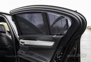 Melns BMW 7 Series 2014 Tallina, ar dzinēja tilpumu 3.00 L un nobraukumu 178 tūkst. km par 18199 €, foto 18 vietnē AUTOMOTO.COM.LV