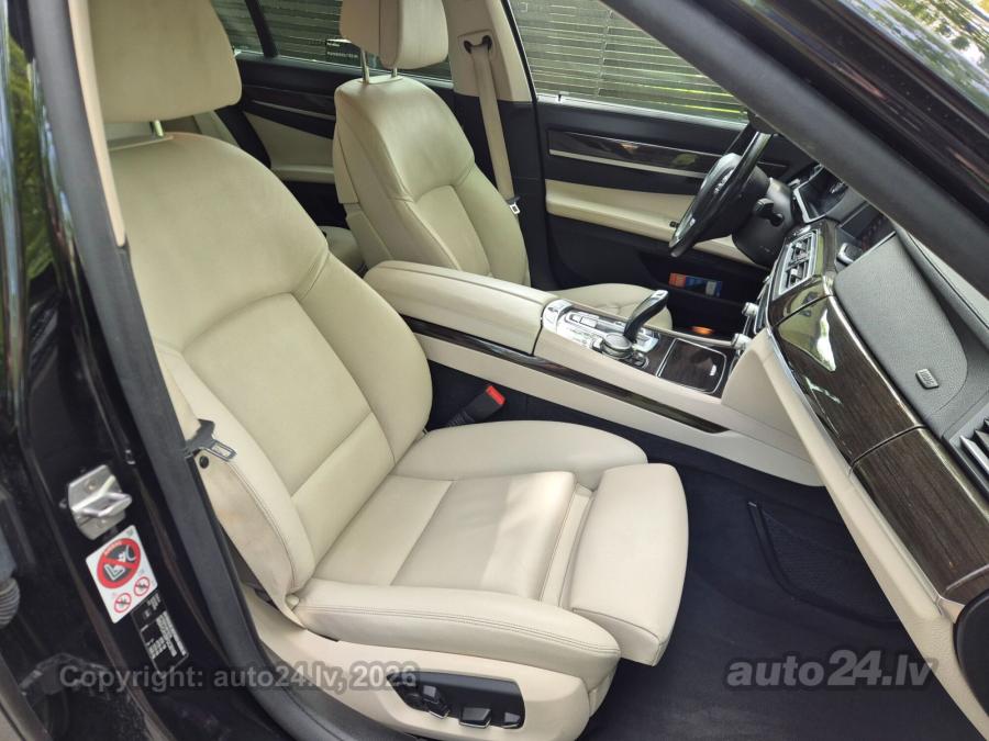 Black BMW 7 Series 2015 in Tallinn, with an engine capacity of 3.00 L and mileage of 186 thousand km for 17900 €, photo 12 on AUTOMOTO.COM.LV