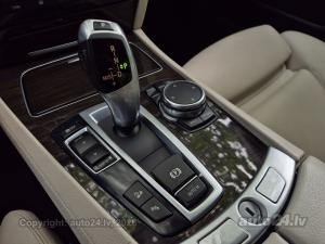 Black BMW 7 Series 2015 in Tallinn, with an engine capacity of 3.00 L and mileage of 186 thousand km for 17900 €, photo 18 on AUTOMOTO.COM.LV