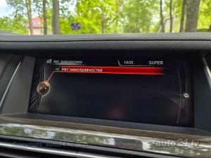 Black BMW 7 Series 2015 in Tallinn, with an engine capacity of 3.00 L and mileage of 186 thousand km for 17900 €, photo 27 on AUTOMOTO.COM.LV